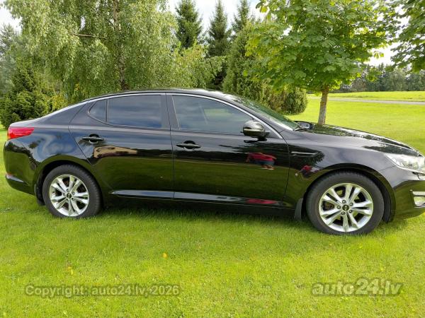 Black Kia Optima 2012 in Rakvere, with an engine capacity of 1.70 L and mileage of 62 thousand km for 6999 €, photo 8 on AUTOMOTO.COM.LV