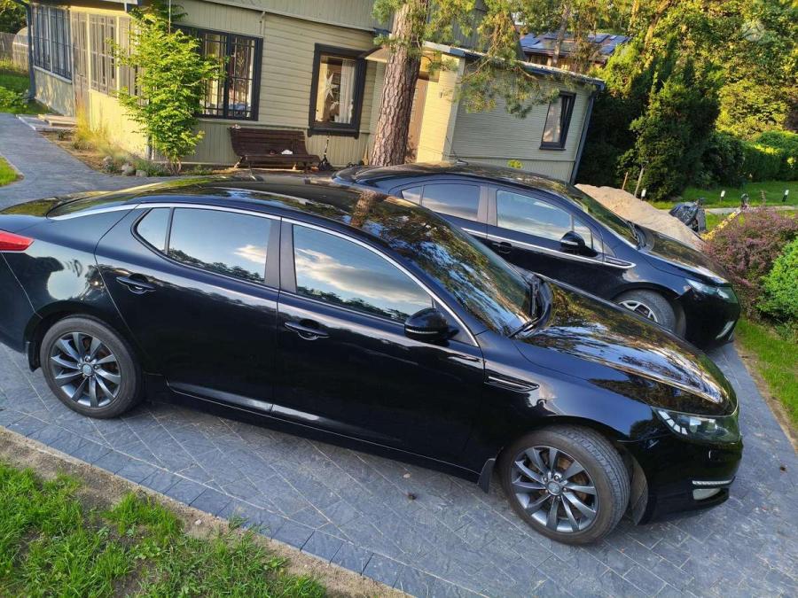 Black Kia Optima 2013 in Vilnius, with an engine capacity of 1.69 L and mileage of 208 thousand km for 5700 €, photo 3 on AUTOMOTO.COM.LV