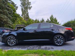 Black Kia Optima 2013 in Vilnius, with an engine capacity of 1.69 L and mileage of 208 thousand km for 5700 €, photo 5 on AUTOMOTO.COM.LV