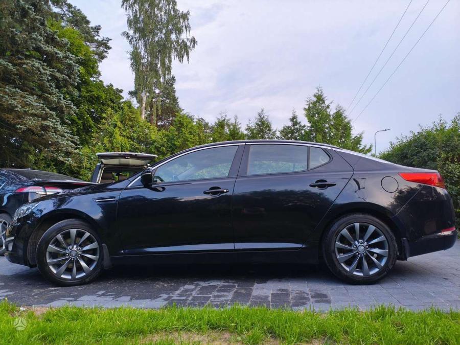 Black Kia Optima 2013 in Vilnius, with an engine capacity of 1.69 L and mileage of 208 thousand km for 5700 €, photo 5 on AUTOMOTO.COM.LV