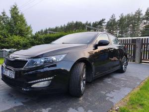 Black Kia Optima 2013 in Vilnius, with an engine capacity of 1.69 L and mileage of 208 thousand km for 5700 €, photo 6 on AUTOMOTO.COM.LV