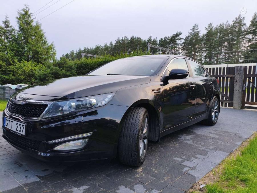 Black Kia Optima 2013 in Vilnius, with an engine capacity of 1.69 L and mileage of 208 thousand km for 5700 €, photo 6 on AUTOMOTO.COM.LV
