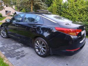Black Kia Optima 2013 in Vilnius, with an engine capacity of 1.69 L and mileage of 208 thousand km for 5700 €, photo 7 on AUTOMOTO.COM.LV