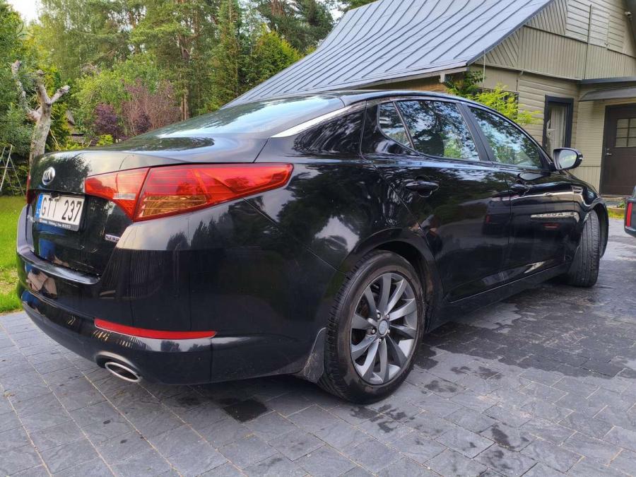 Black Kia Optima 2013 in Vilnius, with an engine capacity of 1.69 L and mileage of 208 thousand km for 5700 €, photo 8 on AUTOMOTO.COM.LV