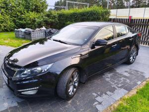 Black Kia Optima 2013 in Vilnius, with an engine capacity of 1.69 L and mileage of 208 thousand km for 5700 €, photo 9 on AUTOMOTO.COM.LV