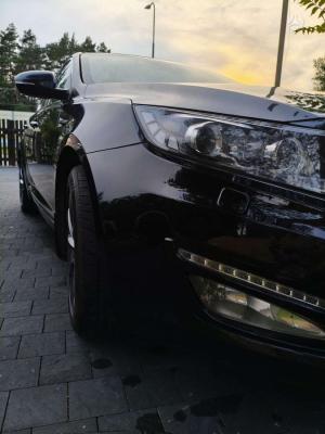 Black Kia Optima 2013 in Vilnius, with an engine capacity of 1.69 L and mileage of 208 thousand km for 5700 €, photo 10 on AUTOMOTO.COM.LV