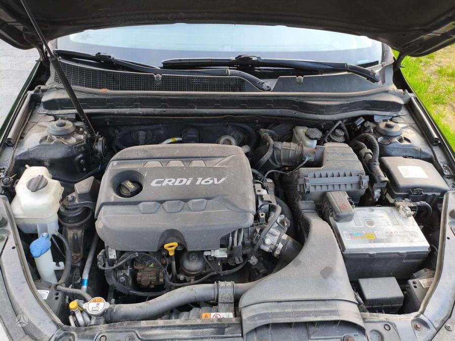 Black Kia Optima 2013 in Vilnius, with an engine capacity of 1.69 L and mileage of 208 thousand km for 5700 €, photo 13 on AUTOMOTO.COM.LV