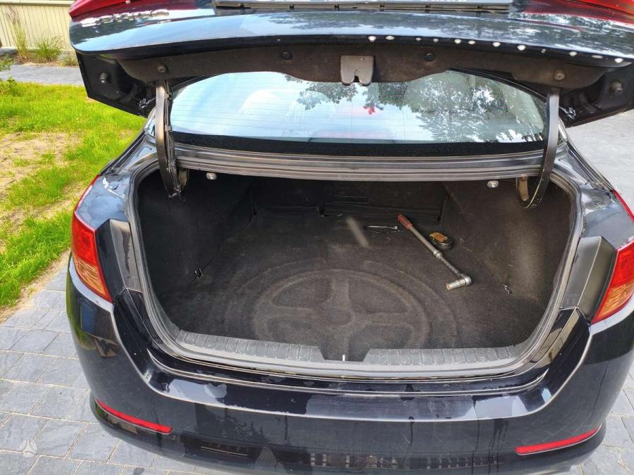Black Kia Optima 2013 in Vilnius, with an engine capacity of 1.69 L and mileage of 208 thousand km for 5700 €, photo 15 on AUTOMOTO.COM.LV