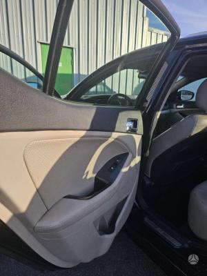 Black Kia Optima 2013 in Kaunas, with an engine capacity of 1.70 L and mileage of 150 thousand km for 7000 €, photo 15 on AUTOMOTO.COM.LV