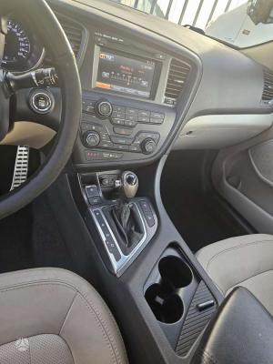 Black Kia Optima 2013 in Kaunas, with an engine capacity of 1.70 L and mileage of 150 thousand km for 7000 €, photo 22 on AUTOMOTO.COM.LV