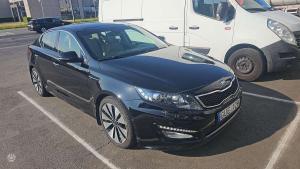 Black Kia Optima 2013 in Kaunas, with an engine capacity of 1.70 L and mileage of 150 thousand km for 7000 €, photo 26 on AUTOMOTO.COM.LV