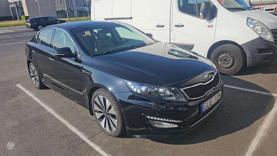 Black Kia Optima 2013 in Kaunas, with an engine capacity of 1.70 L and mileage of 150 thousand km for 7000 €, photo 26 on AUTOMOTO.COM.LV