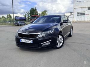 Black Kia Optima 2013 in Panevezys, with an engine capacity of 1.70 L and mileage of 191 thousand km for 5590 €, photo 4 on AUTOMOTO.COM.LV