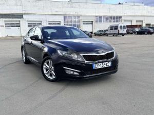 Black Kia Optima 2013 in Panevezys, with an engine capacity of 1.70 L and mileage of 191 thousand km for 5590 €, photo 5 on AUTOMOTO.COM.LV