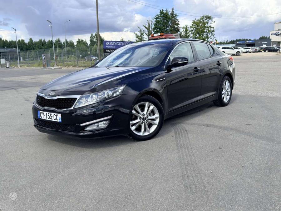 Black Kia Optima 2013 in Panevezys, with an engine capacity of 1.70 L and mileage of 191 thousand km for 5590 €, photo 6 on AUTOMOTO.COM.LV
