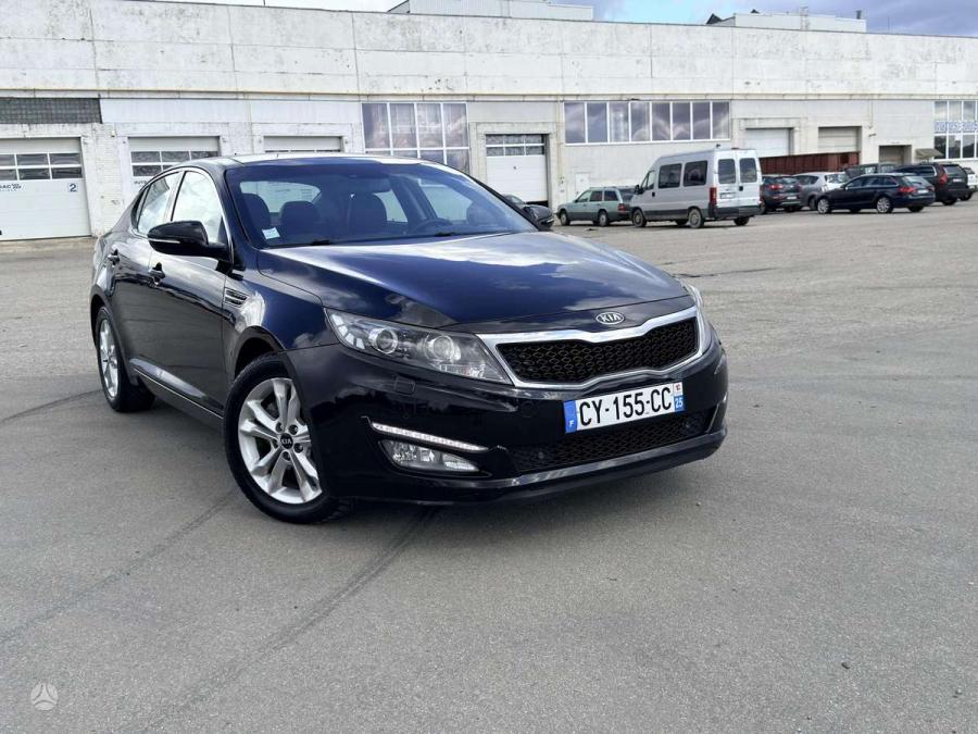 Black Kia Optima 2013 in Panevezys, with an engine capacity of 1.70 L and mileage of 191 thousand km for 5590 €, photo 7 on AUTOMOTO.COM.LV
