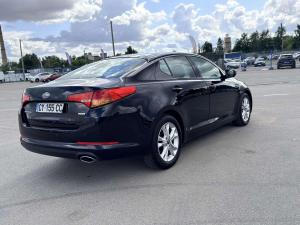 Black Kia Optima 2013 in Panevezys, with an engine capacity of 1.70 L and mileage of 191 thousand km for 5590 €, photo 9 on AUTOMOTO.COM.LV
