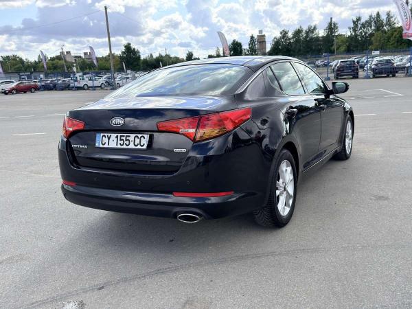 Black Kia Optima 2013 in Panevezys, with an engine capacity of 1.70 L and mileage of 191 thousand km for 5590 €, photo 10 on AUTOMOTO.COM.LV