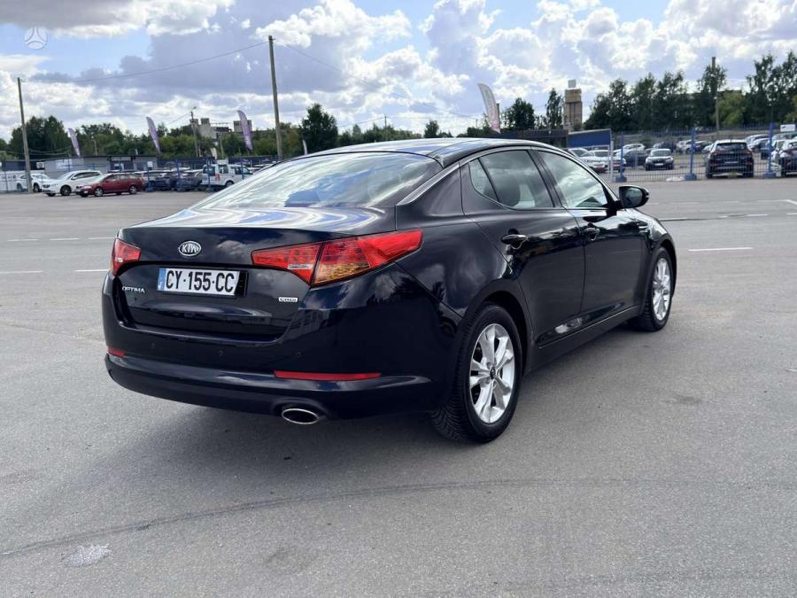 Black Kia Optima 2013 in Panevezys, with an engine capacity of 1.70 L and mileage of 191 thousand km for 5590 €, photo 13 on AUTOMOTO.COM.LV