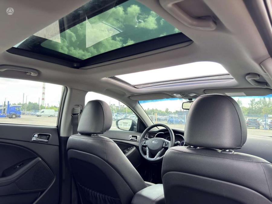 Black Kia Optima 2013 in Panevezys, with an engine capacity of 1.70 L and mileage of 191 thousand km for 5590 €, photo 16 on AUTOMOTO.COM.LV