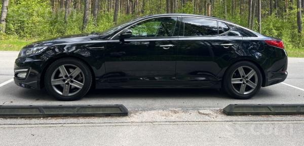 Black Kia Optima 2013 in Riga, with an engine capacity of 1.70 L and mileage of 249 thousand km for 6700 €, photo 4 on AUTOMOTO.COM.LV