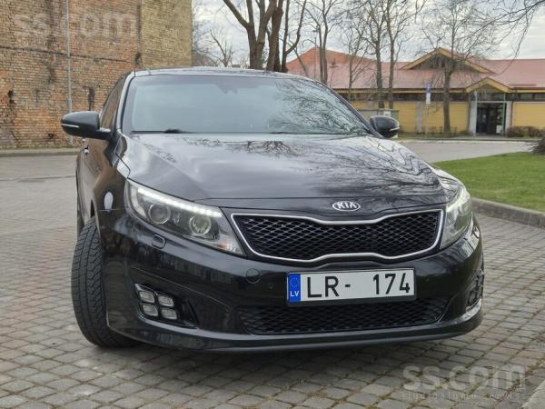 Black Kia Optima 2014 in Ventspils, with an engine capacity of 1.70 L and mileage of 145 thousand km for 7000 €, photo 1 on AUTOMOTO.COM.LV