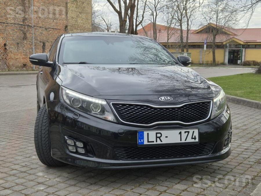 Black Kia Optima 2014 in Ventspils, with an engine capacity of 1.70 L and mileage of 145 thousand km for 7000 €, photo 1 on AUTOMOTO.COM.LV