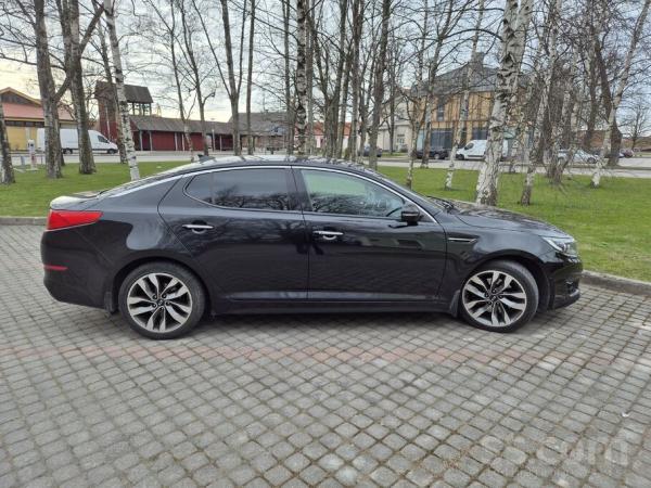 Black Kia Optima 2014 in Ventspils, with an engine capacity of 1.70 L and mileage of 145 thousand km for 7000 €, photo 6 on AUTOMOTO.COM.LV