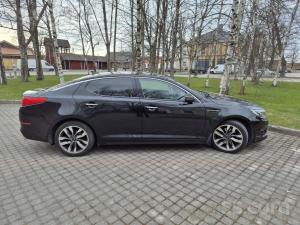 Black Kia Optima 2014 in Ventspils, with an engine capacity of 1.70 L and mileage of 145 thousand km for 7000 €, photo 7 on AUTOMOTO.COM.LV