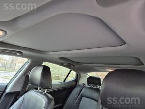 Black Kia Optima 2014 in Ventspils, with an engine capacity of 1.70 L and mileage of 145 thousand km for 7000 €, photo 19 on AUTOMOTO.COM.LV