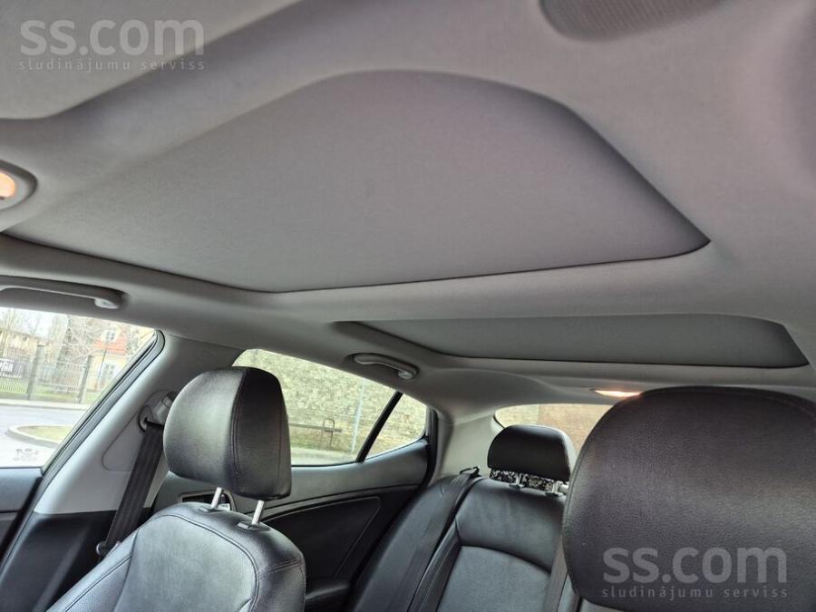 Black Kia Optima 2014 in Ventspils, with an engine capacity of 1.70 L and mileage of 145 thousand km for 7000 €, photo 19 on AUTOMOTO.COM.LV