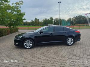 Black Kia Optima 2014 in Jelgava, with an engine capacity of 1.70 L and mileage of 199 thousand km for 6300 €, photo  on AUTOMOTO.COM.LV