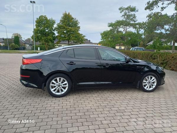 Black Kia Optima 2014 in Jelgava, with an engine capacity of 1.70 L and mileage of 199 thousand km for 6300 €, photo 4 on AUTOMOTO.COM.LV
