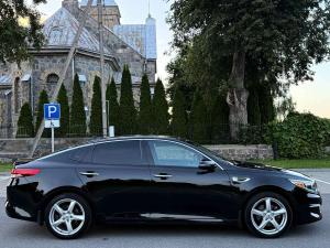 Black Kia Optima 2016 in Vilnius, with an engine capacity of 2.40 L and mileage of 126 thousand km for 6950 €, photo 8 on AUTOMOTO.COM.LV
