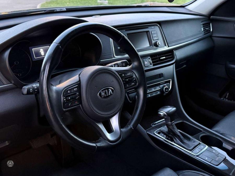 Black Kia Optima 2016 in Vilnius, with an engine capacity of 2.40 L and mileage of 126 thousand km for 6950 €, photo 16 on AUTOMOTO.COM.LV
