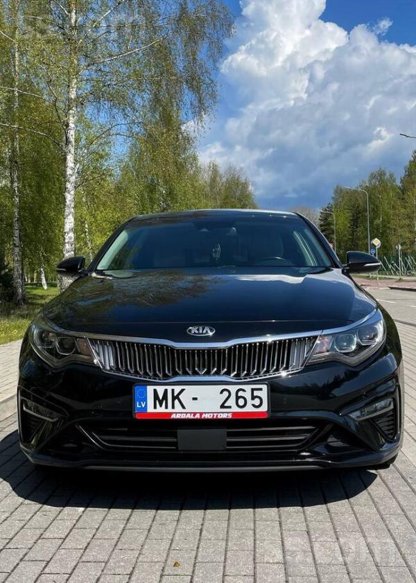 Black Kia Optima 2020 in Liepaja, with an engine capacity of 1.60 L and mileage of 70 thousand km for 12490 €, photo 2 on AUTOMOTO.COM.LV