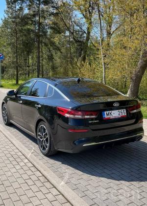 Black Kia Optima 2020 in Liepaja, with an engine capacity of 1.60 L and mileage of 70 thousand km for 12490 €, photo 3 on AUTOMOTO.COM.LV