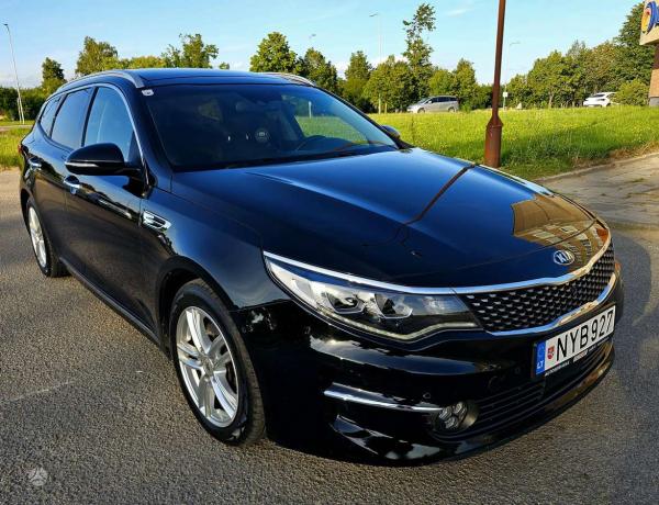 Black Kia Optima 2016 in Siauliai, with an engine capacity of 1.69 L and mileage of 150 thousand km for 9850 €, photo 1 on AUTOMOTO.COM.LV