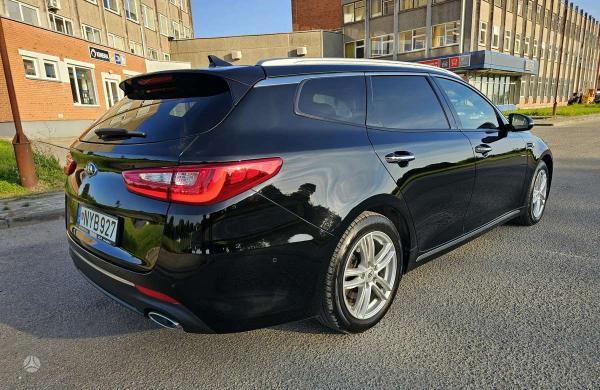 Black Kia Optima 2016 in Siauliai, with an engine capacity of 1.69 L and mileage of 150 thousand km for 9850 €, photo 6 on AUTOMOTO.COM.LV