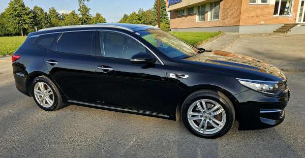 Black Kia Optima 2016 in Siauliai, with an engine capacity of 1.69 L and mileage of 150 thousand km for 9850 €, photo 8 on AUTOMOTO.COM.LV