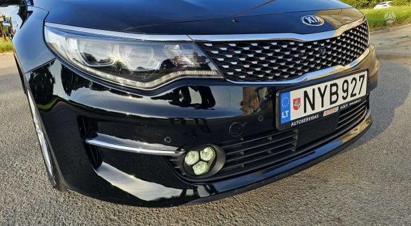 Black Kia Optima 2016 in Siauliai, with an engine capacity of 1.69 L and mileage of 150 thousand km for 9850 €, photo 10 on AUTOMOTO.COM.LV