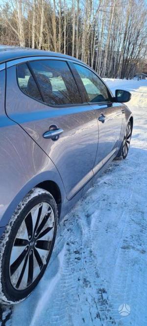 Zils Kia Optima 2013 Viļņa, ar dzinēja tilpumu 1.70 L un nobraukumu 194 tūkst. km par 6000 €, foto 25 vietnē AUTOMOTO.COM.LV