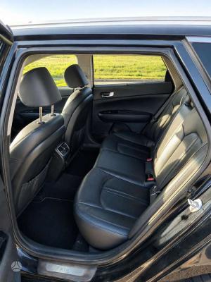 Blue Kia Optima 2017 in Panevezys, with an engine capacity of 1.70 L and mileage of 118 thousand km for 10200 €, photo 7 on AUTOMOTO.COM.LV