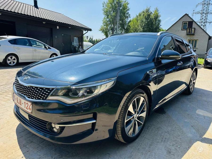 Blue Kia Optima 2018 in Kaunas, with an engine capacity of 1.69 L and mileage of 170 thousand km for 9850 €, photo 4 on AUTOMOTO.COM.LV