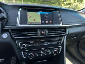 Blue Kia Optima 2018 in Kaunas, with an engine capacity of 1.69 L and mileage of 170 thousand km for 9850 €, photo 18 on AUTOMOTO.COM.LV