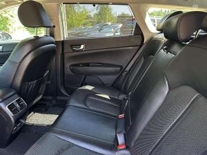 Blue Kia Optima 2018 in Kaunas, with an engine capacity of 1.69 L and mileage of 170 thousand km for 9850 €, photo 21 on AUTOMOTO.COM.LV
