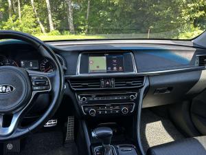 Blue Kia Optima 2018 in Kaunas, with an engine capacity of 1.69 L and mileage of 170 thousand km for 9850 €, photo 25 on AUTOMOTO.COM.LV