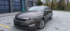 Brown Kia Optima 2012 in Vilnius, with an engine capacity of 1.69 L and mileage of 270 thousand km for 2200 €, photo  on AUTOMOTO.COM.LV