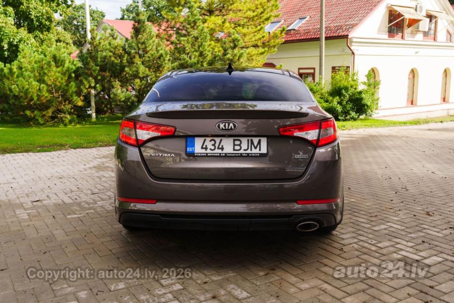 Brown Kia Optima 2013 in Tartu, with an engine capacity of 1.70 L and mileage of 207 thousand km for 6500 €, photo 6 on AUTOMOTO.COM.LV