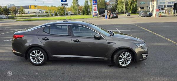 Kia Optima 2013 Viļņa vietnē Brūns Kia Optima 2013 Viļņa, ar dzinēja tilpumu 1.69 L un nobraukumu 267 tūkst. km par 5100 €, foto 5 vietnē AUTOMOTO.COM.LV
